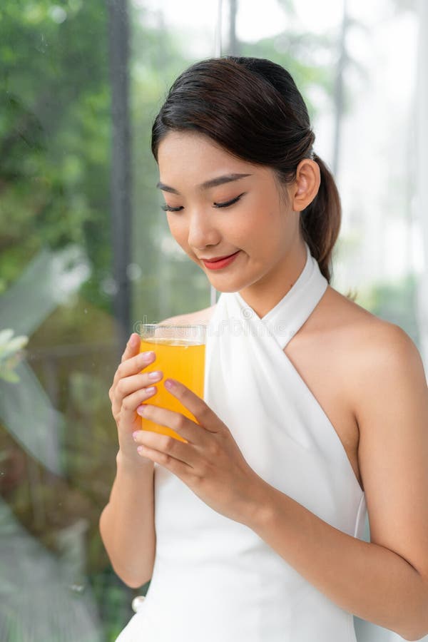 Young Beautiful Woman Drinking Juice Stock Photo - Image of woman ...