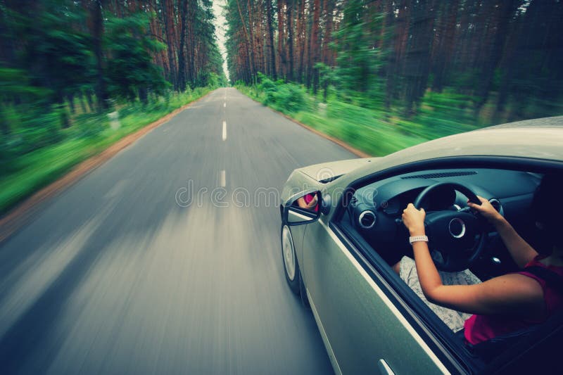 Young Beautiful Woman Driving Car - Rear View Stock Image - Image of ...