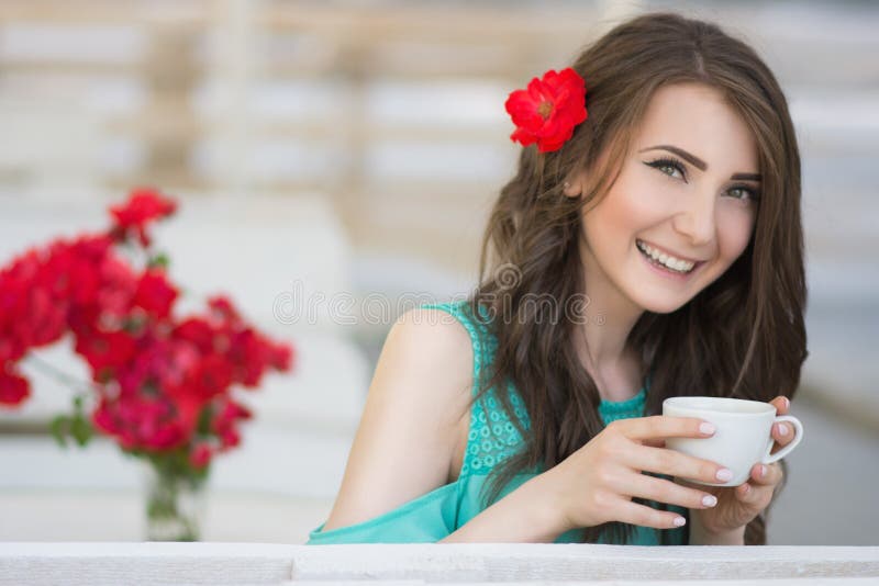 Young Beautiful Woman Holds Cup of Tea in Cafe Stock Photo - Image of ...