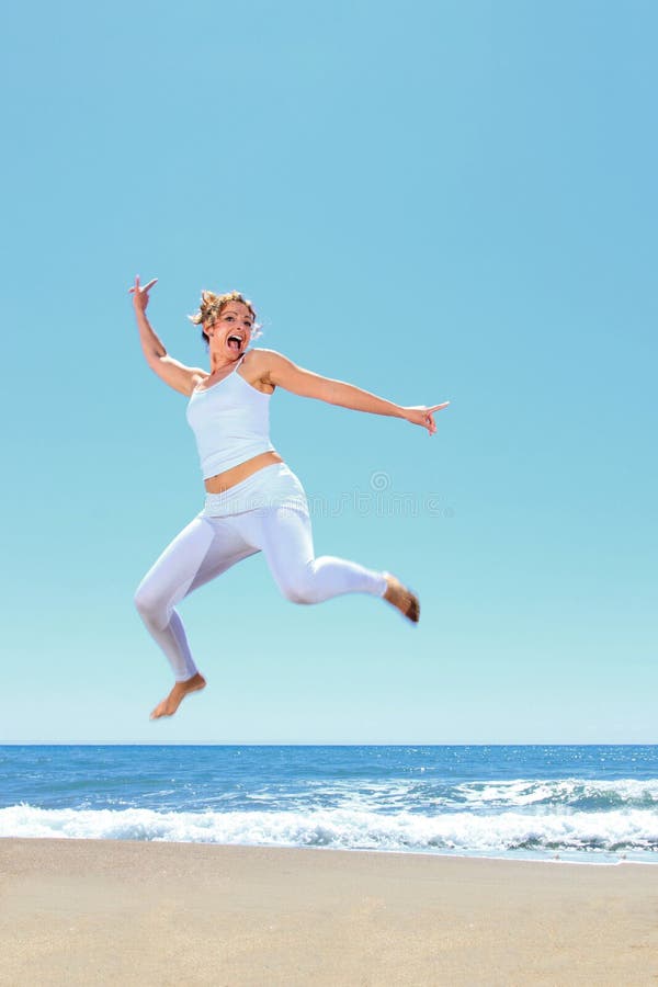 Young Beautiful Woman Jumping Stock Image - Image of healthy, energy ...