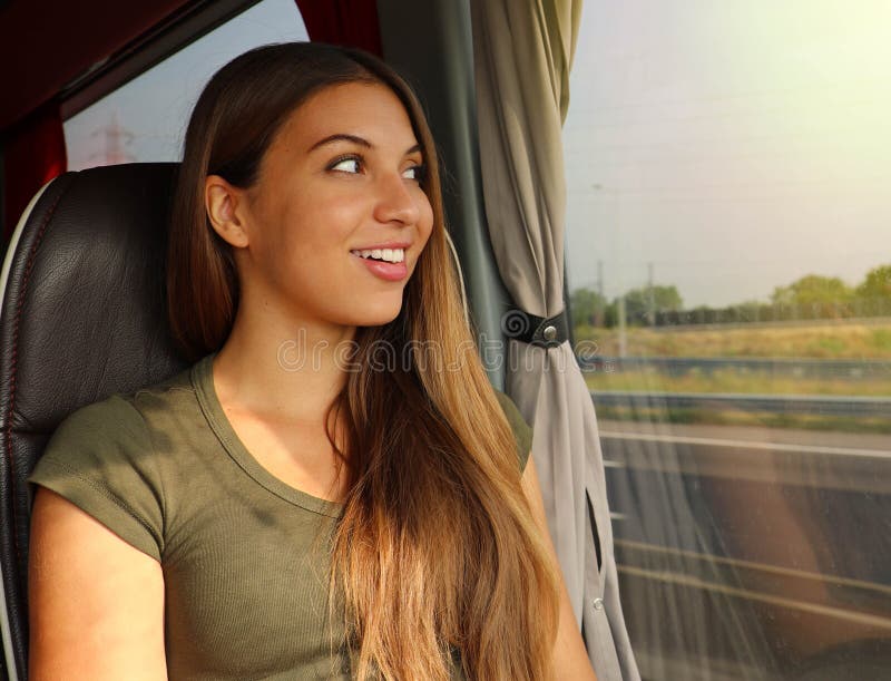 Young Beautiful Woman Looking Through The Bus Window Happy Bus