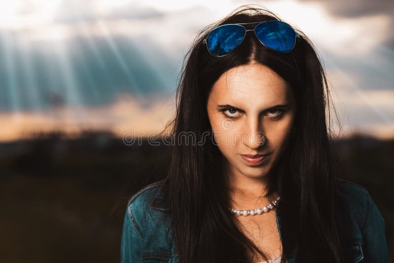 Young Beautiful Woman Looks Stock Photo - Image of field, bleak: 41551372