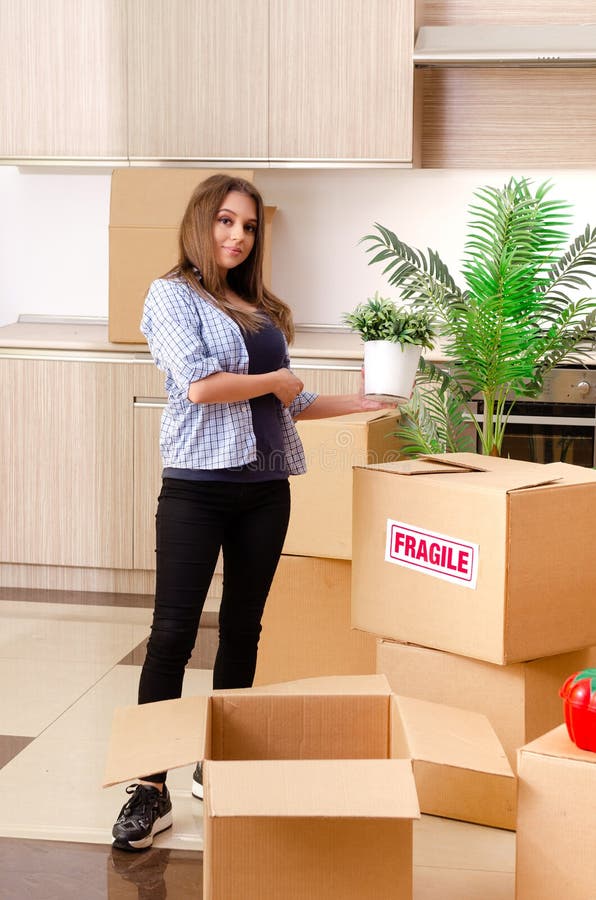 The Young Beautiful Woman Moving To New Flat Stock Image - Image of ...