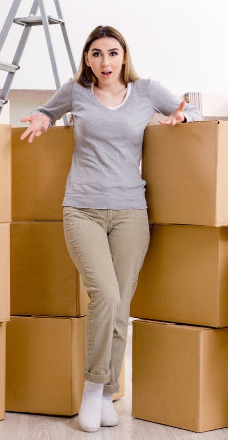 Young Beautiful Woman Moving To New Flat Stock Image - Image of flat ...