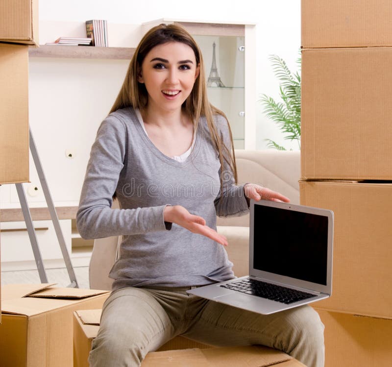 Young Beautiful Woman Moving To New Flat Stock Photo - Image of ...