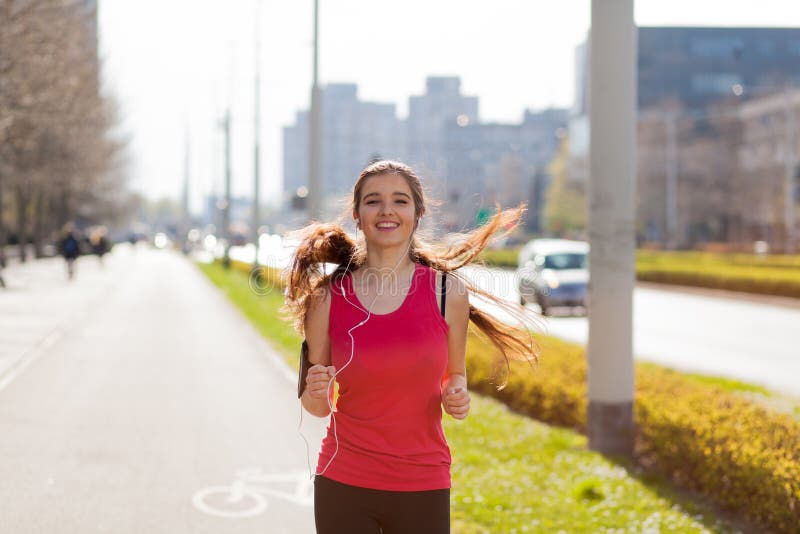 Young Beautiful Woman Running in the City Stock Image - Image of runner ...