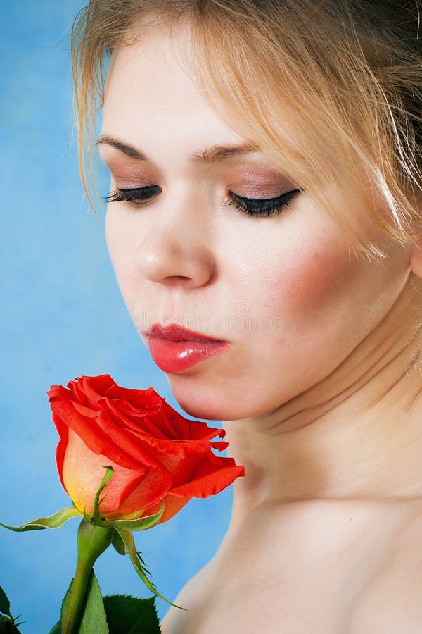 Young Beautiful Woman with a Single Red Rose Stock Photo - Image of ...
