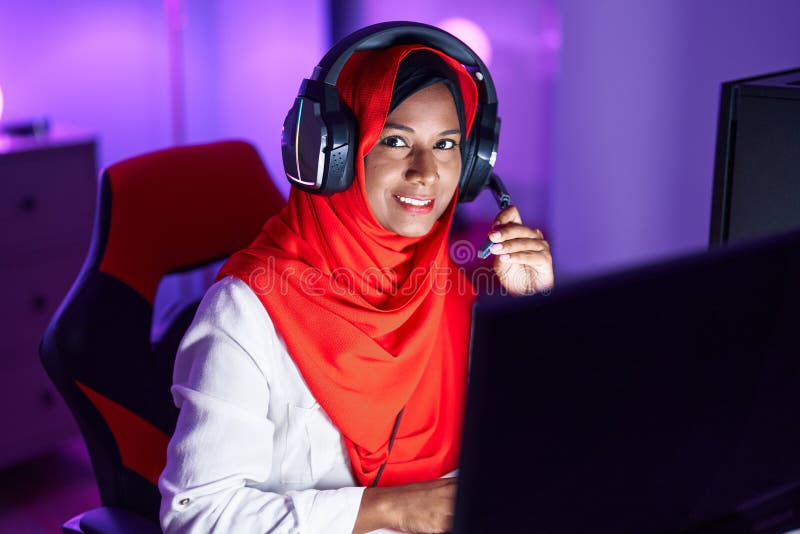 Young Beautiful Woman Streamer Playing Video Game Using Computer at ...