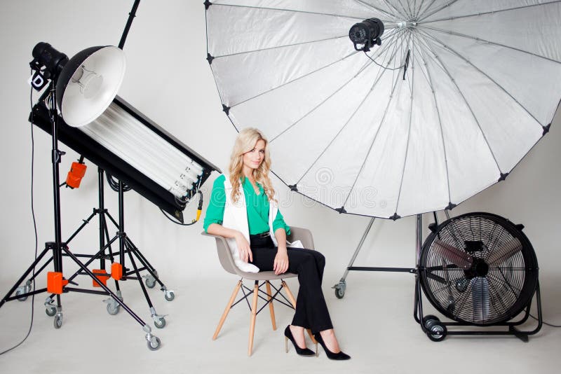 Young Beautiful Woman in Studio, Lighting Spotlights on the Background ...