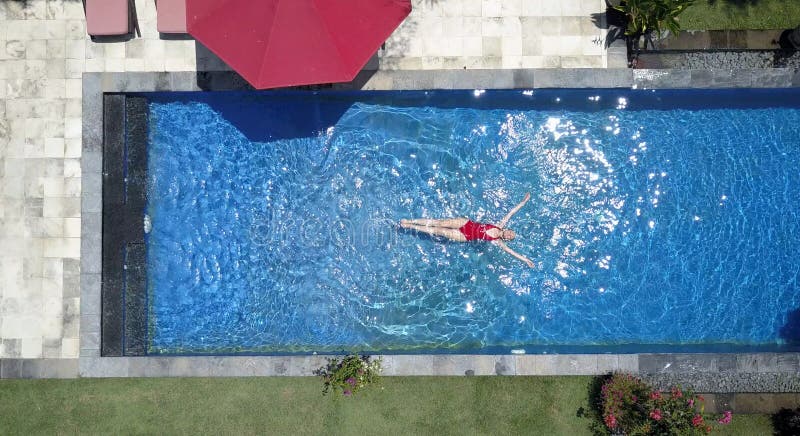 The Young Beautiful Woman Swims in the Pool, Flat Lay, Dron View Stock ...