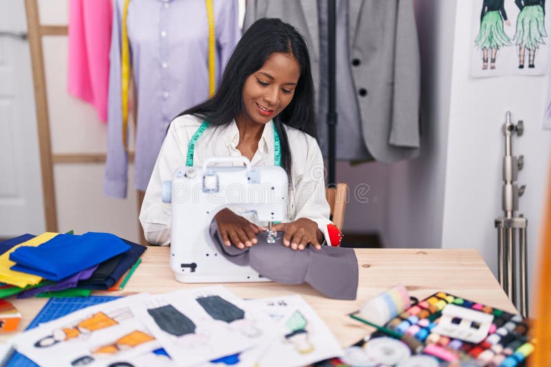 Young Beautiful Woman Tailor Smiling Confident Using Sewing Machine at ...