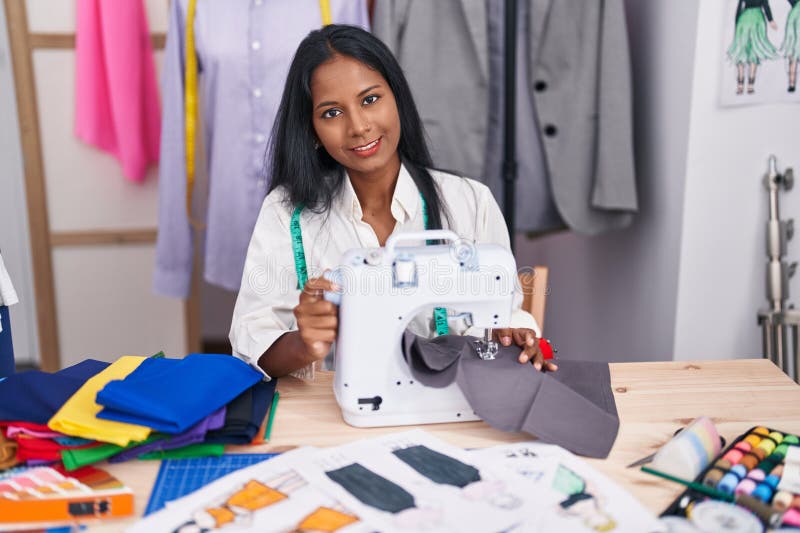Young Beautiful Woman Tailor Smiling Confident Using Sewing Machine at ...