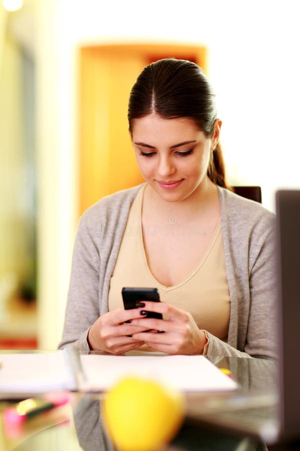 Young Beautiful Woman Typing on Smartphone Stock Photo - Image of ...