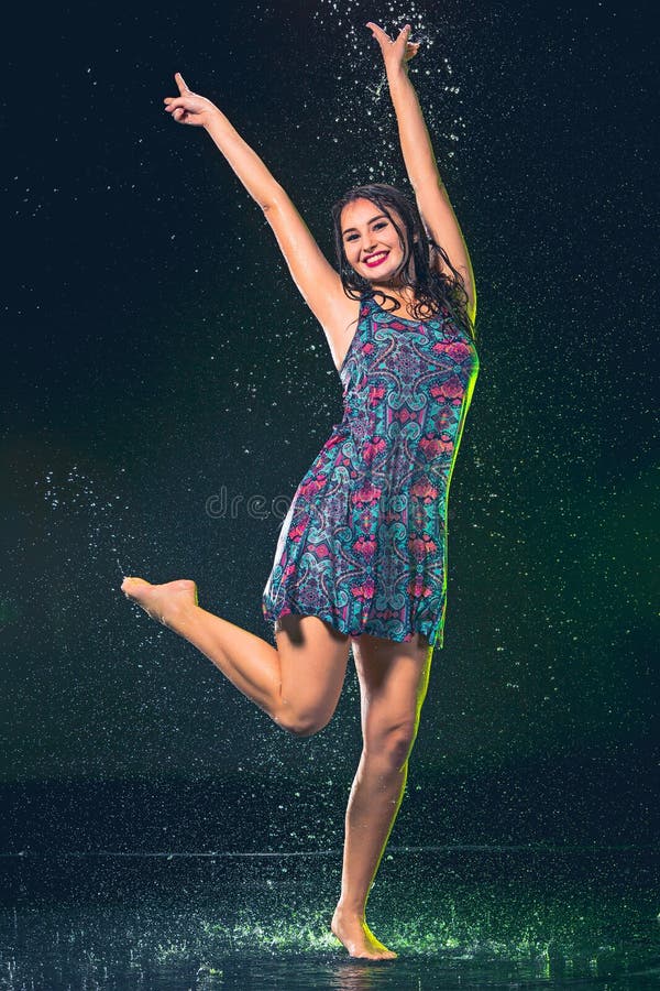 Young Beautiful Woman Under Splash of Rain Stock Image - Image of ...