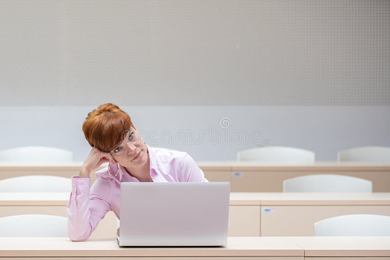 Young Beautiful Woman on a University Lecture Working on a Laptop Stock ...
