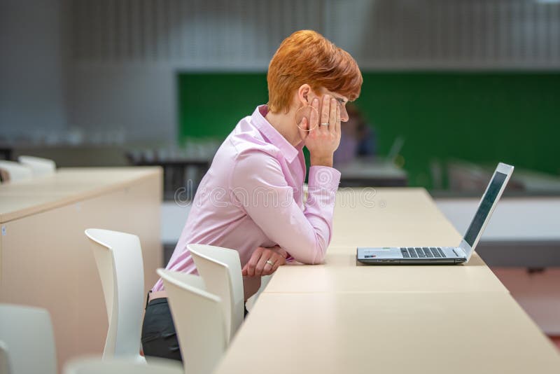 Young Beautiful Woman on a University Lecture Working on a Laptop Stock ...