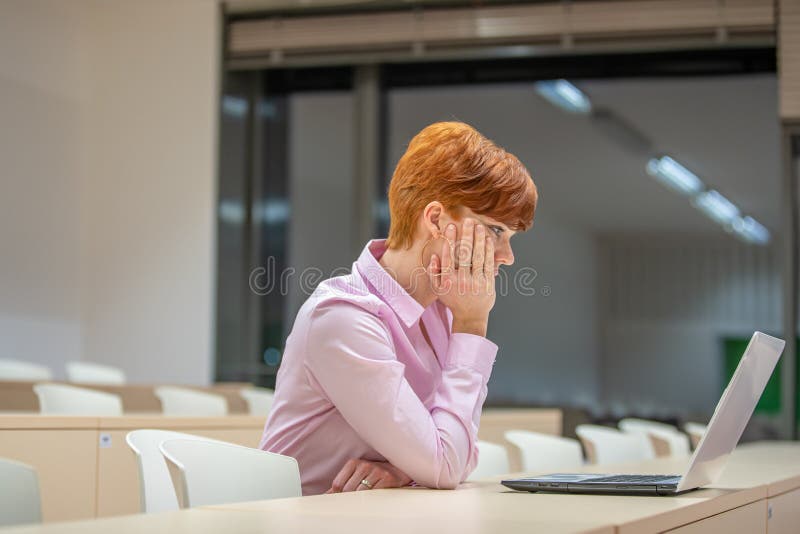 Young Beautiful Woman on a University Lecture Working on a Laptop Stock ...