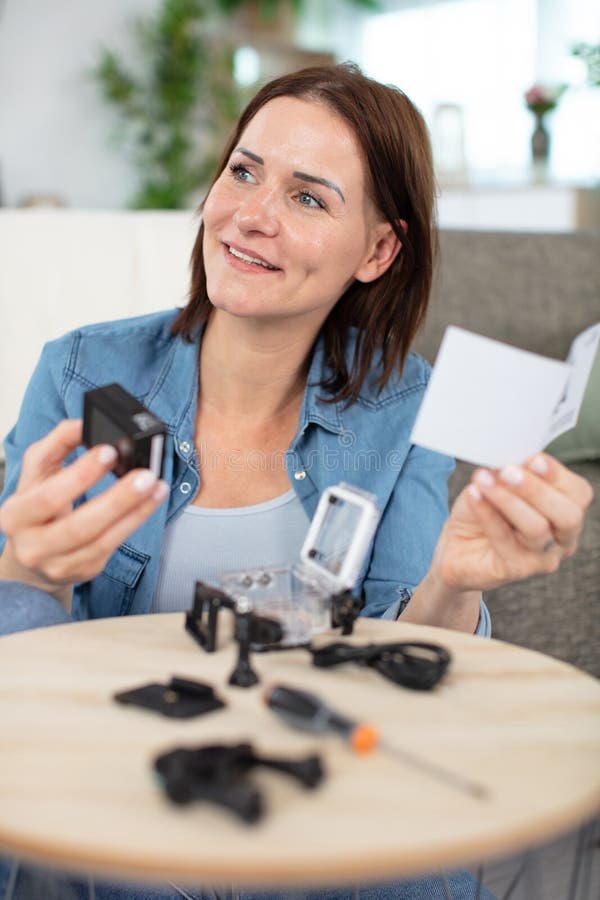 Young Beautiful Woman Using Extreme Camera at Home Stock Image - Image ...
