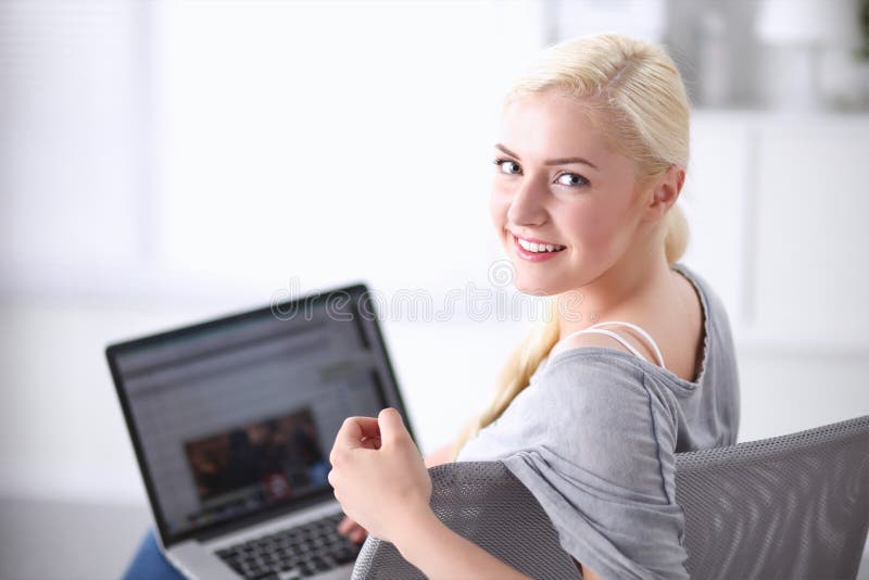Young Beautiful Woman Using a Laptop Computer at Stock Image - Image of ...