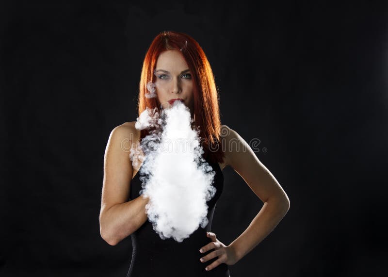 Young Beautiful Woman Vaping E-cigarette. Stock Photo - Image of ...