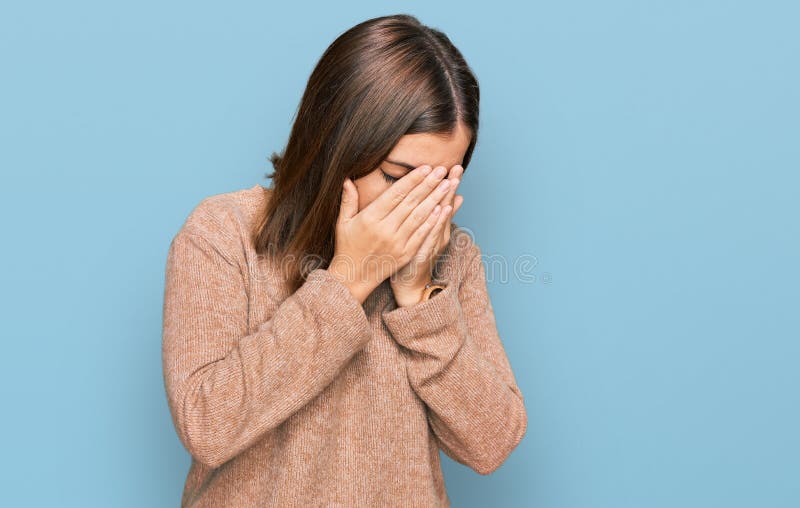 Young Beautiful Woman Wearing Casual Clothes With Sad Expression