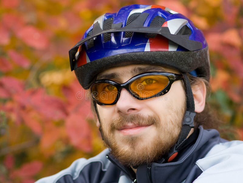 Young Bicycler on the Background of Autumn Leaves Stock Photo - Image ...