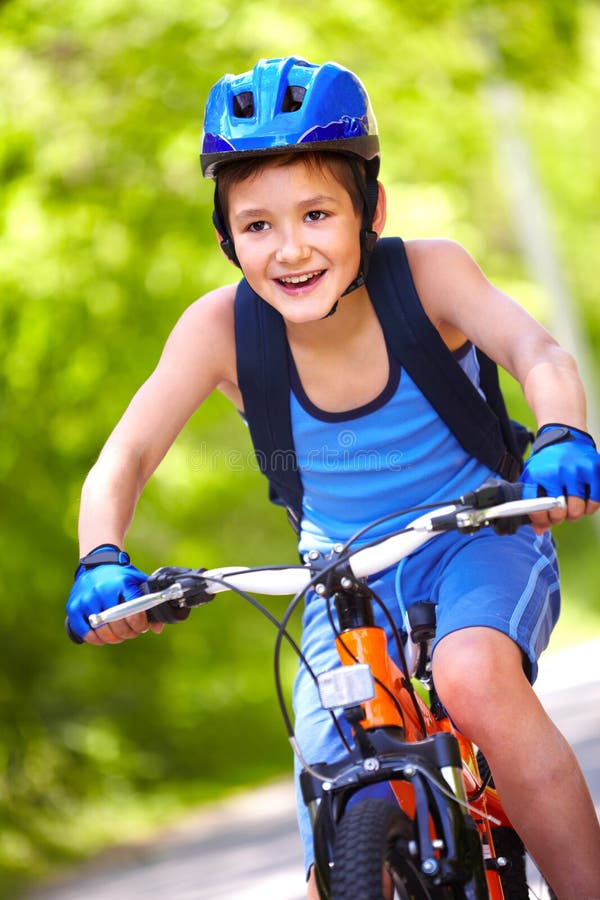 Young bicyclist stock image. Image of male, childhood - 22620593