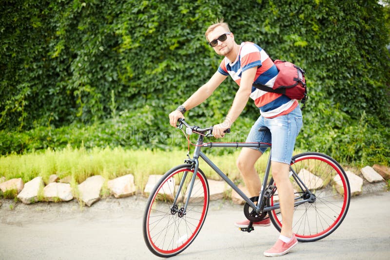 Young bicyclist stock image. Image of portrait, adult - 57055233