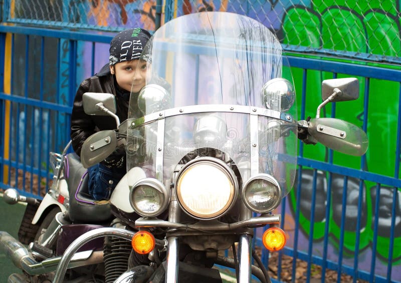 Young Biker on a Motorcycle Stock Photo - Image of rider, male: 34240052