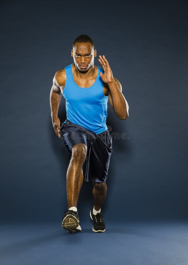 African American Athlete Running on a Wooded Path Stock Image - Image ...