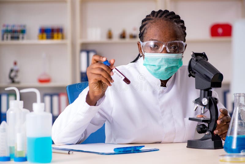 The Young Black Chemist Working in the Lab Stock Image - Image of ...