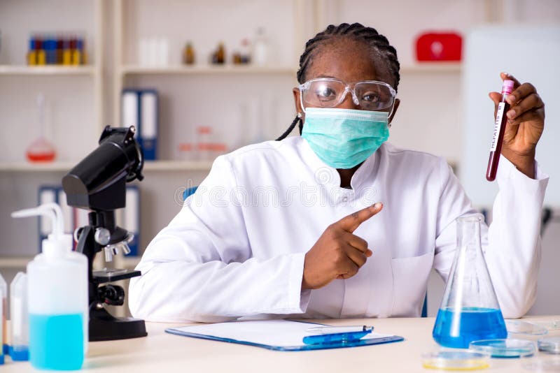 The Young Black Chemist Working in the Lab Stock Photo - Image of ...