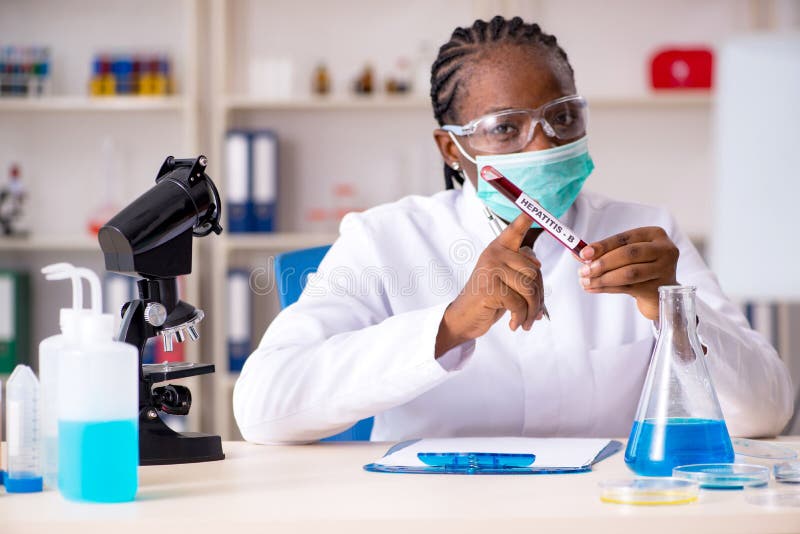 The Young Black Chemist Working in the Lab Stock Image - Image of ...
