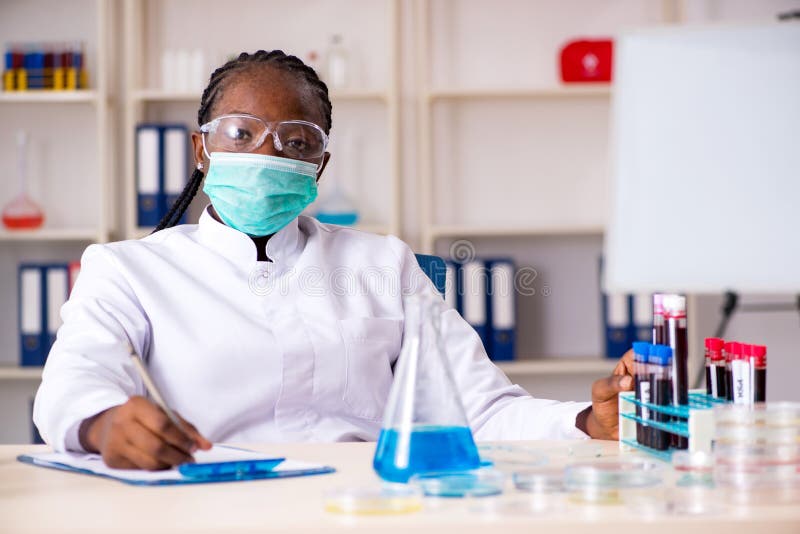 The Young Black Chemist Working in the Lab Stock Image - Image of ...