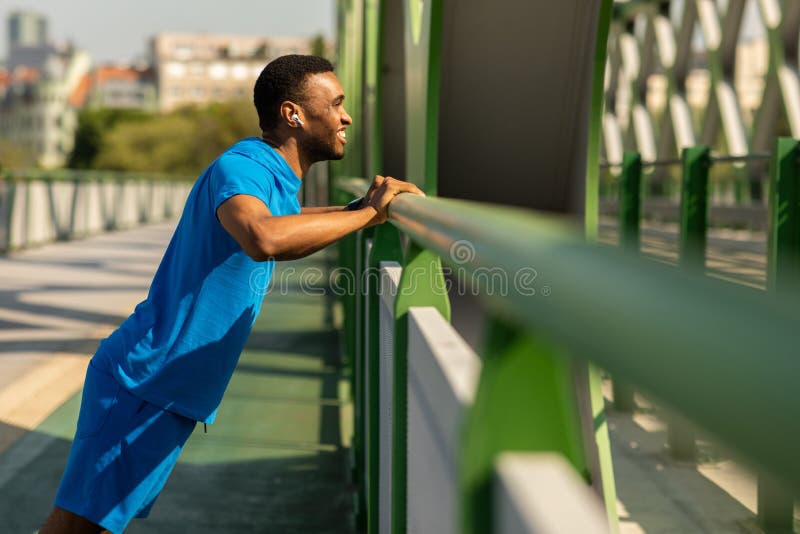 Young Black Man Exercising Outdoors Doing Push-ups, Side View, Free ...