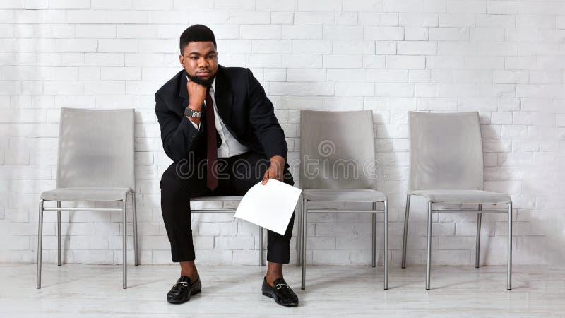 Young Black Man Feeling Exhausted from Waiting for His Job Interview in ...