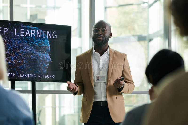 Young Black Man in Formalwear Standing by Interactive Board during ...