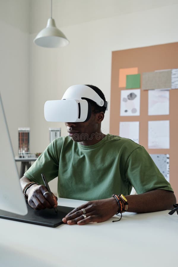 Young Black Man in Green T-shirt Creating New Computer Games or Website ...