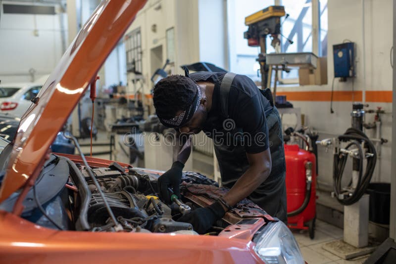Young Black Man with Handtool Checking Car Engine Stock Photo - Image ...