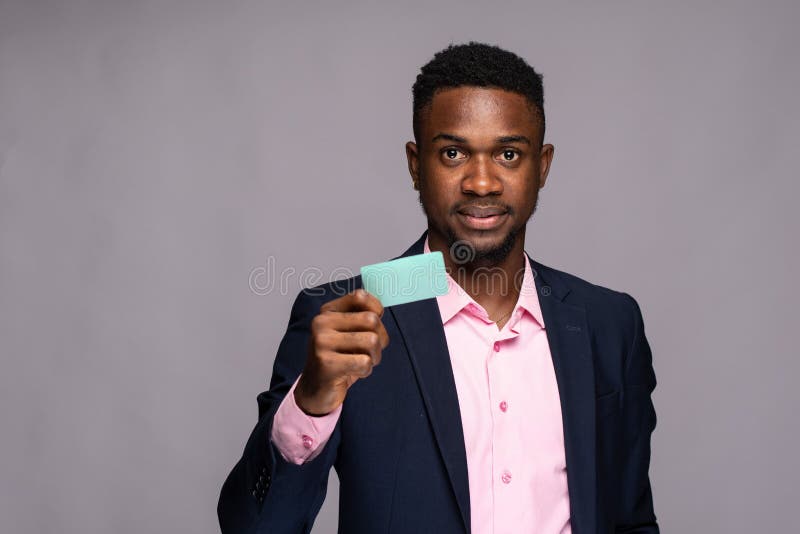 Young Black Man Holding a Card Stock Image - Image of corporate ...