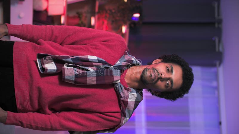 Young Black Man with a Straight Face Clapping His Hands while Standing ...