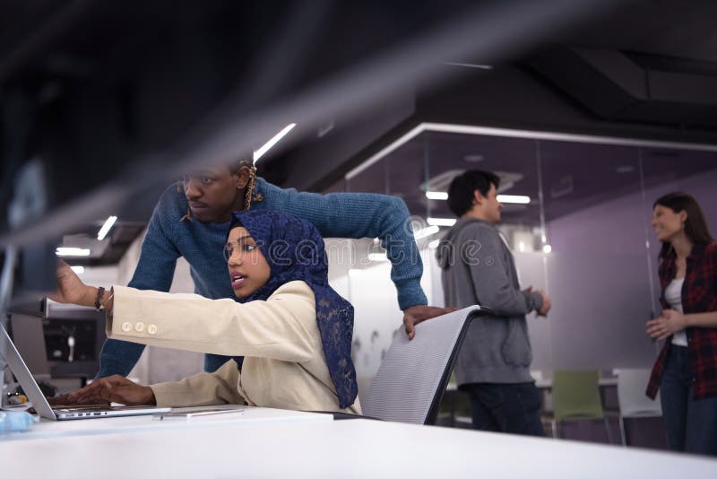 Young Black Muslim Female Software Developer at Work Stock Image ...