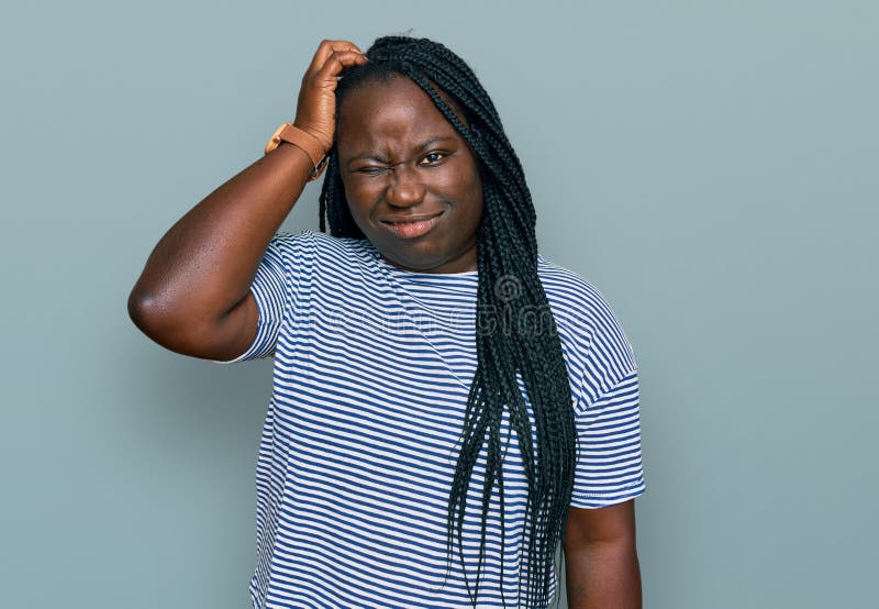 Young Black Woman With Braids Wearing Casual Clothes Confuse And Wonder