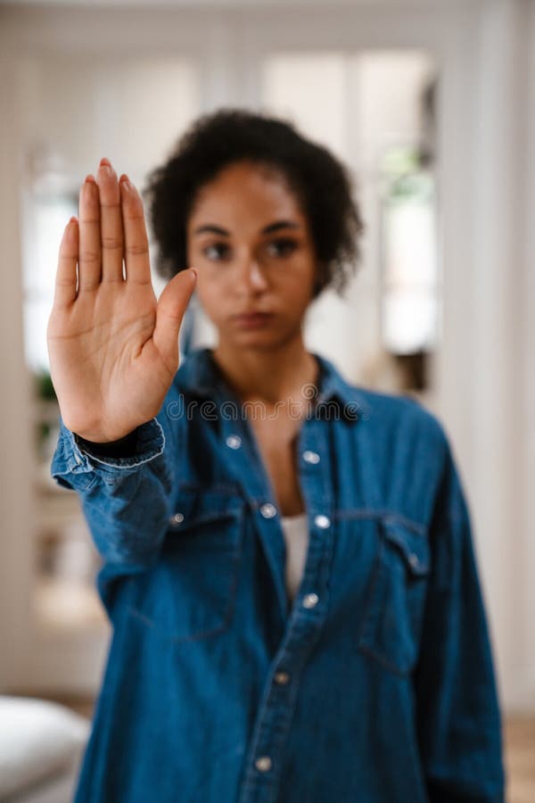 Young Black Woman Gesturing Stop Sign and Protesting Against Abortion ...