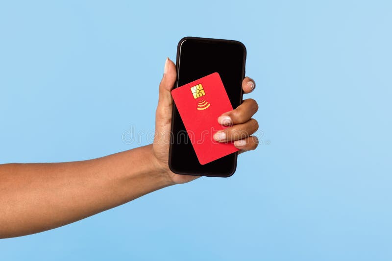 Young Black Woman Highlights Mobile Payment Tech on Blue Backdrop Stock ...