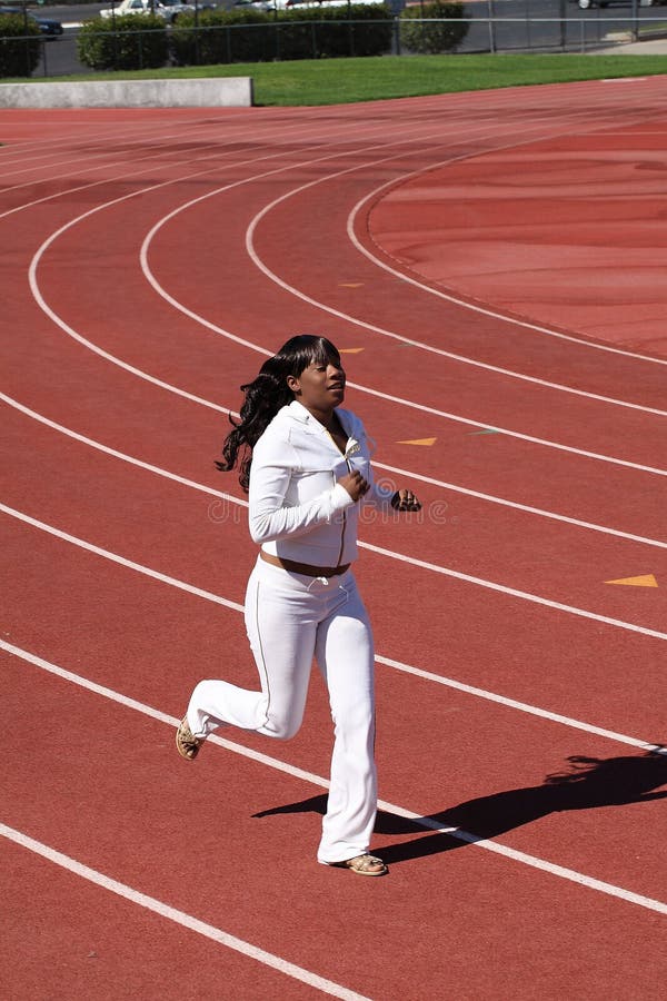 Young Black Woman Walking Sweat Suit on Track Stock Image - Image of ...