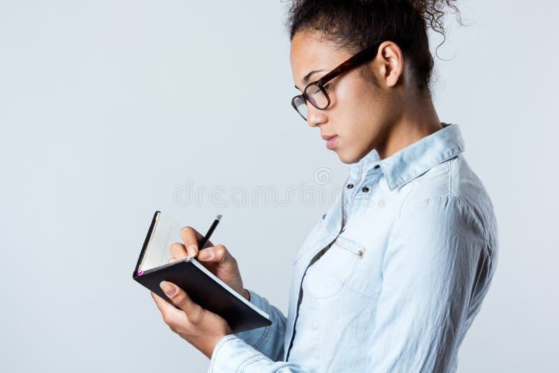 Young Black Woman Taking Notes at Home Stock Image - Image of study ...
