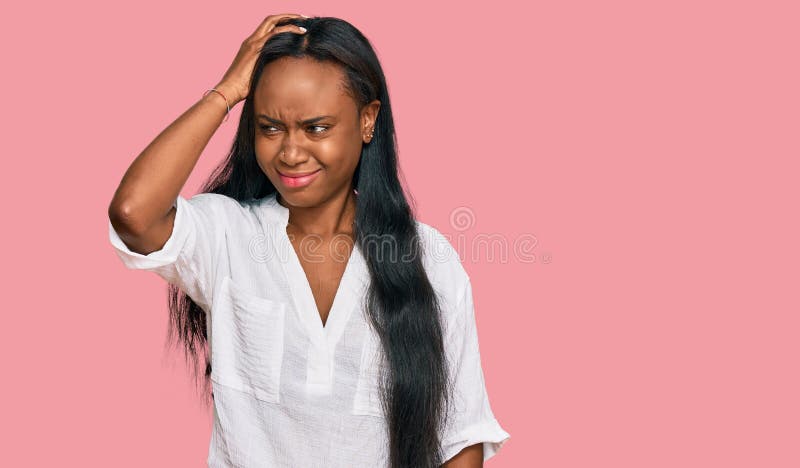 Young Black Woman Wearing Casual Clothes Confuse And Wonder About
