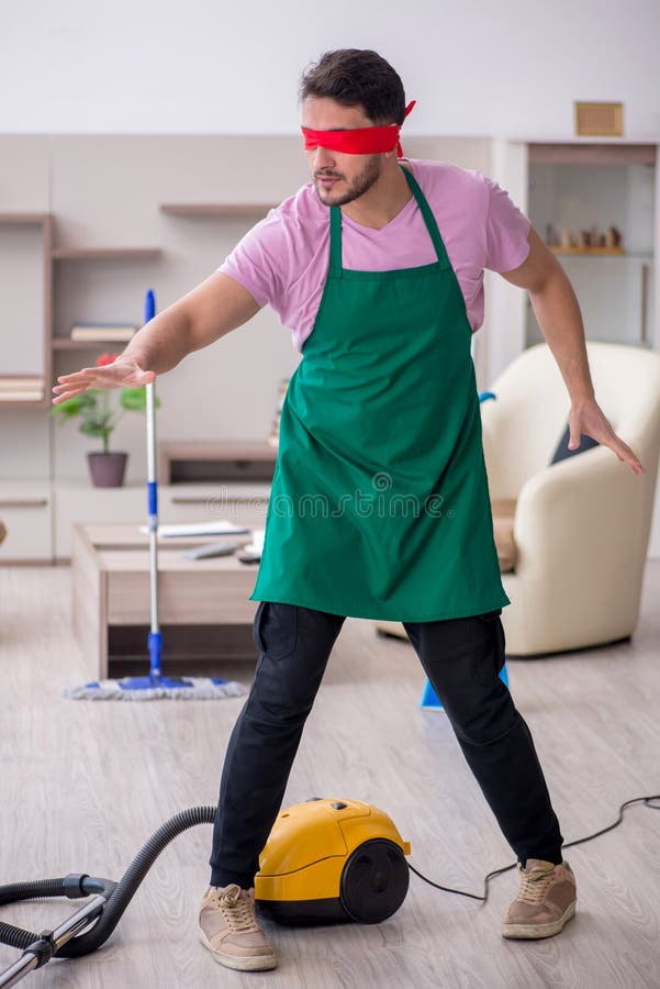 Young Blinfolded Male Contractor Cleaning the House Stock Image - Image ...