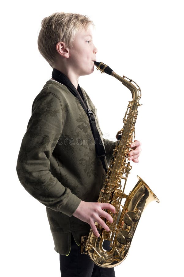 Young Blond Boy and Saxophone in Studio Stock Photo - Image of ...